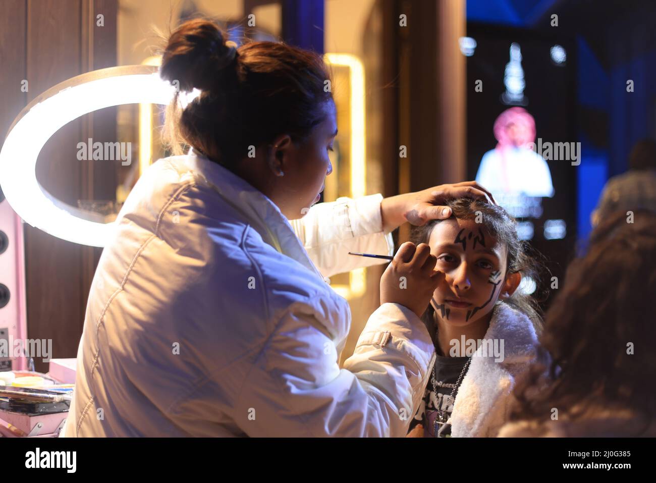 Riyadh, Saudi Arabia. 18th Mar, 2022. Participants work on face ...