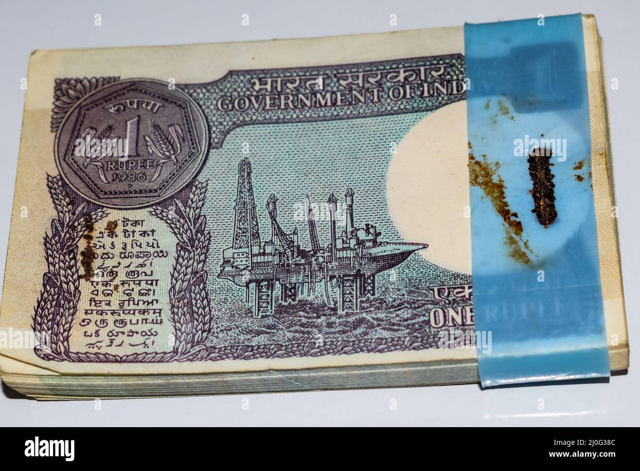 Old One Rupee notes combined on the table, India money on the rotating ...