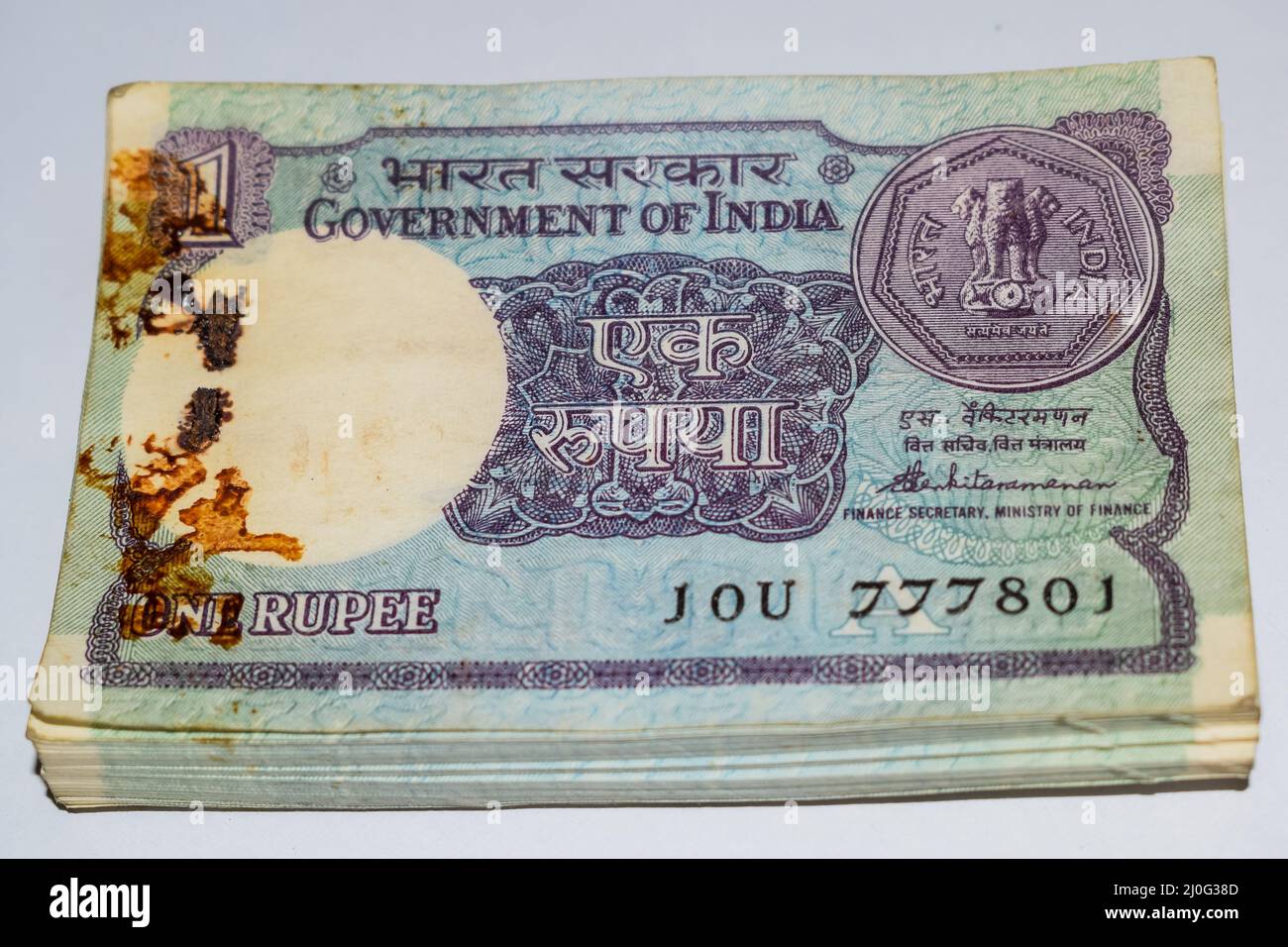 Old One Rupee notes combined on the table, India money on the rotating ...