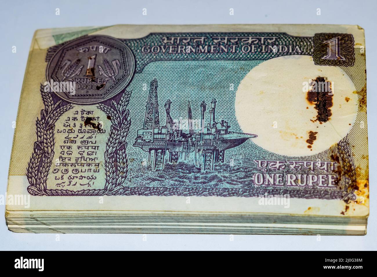 Old One Rupee notes combined on the table, India money on the rotating ...