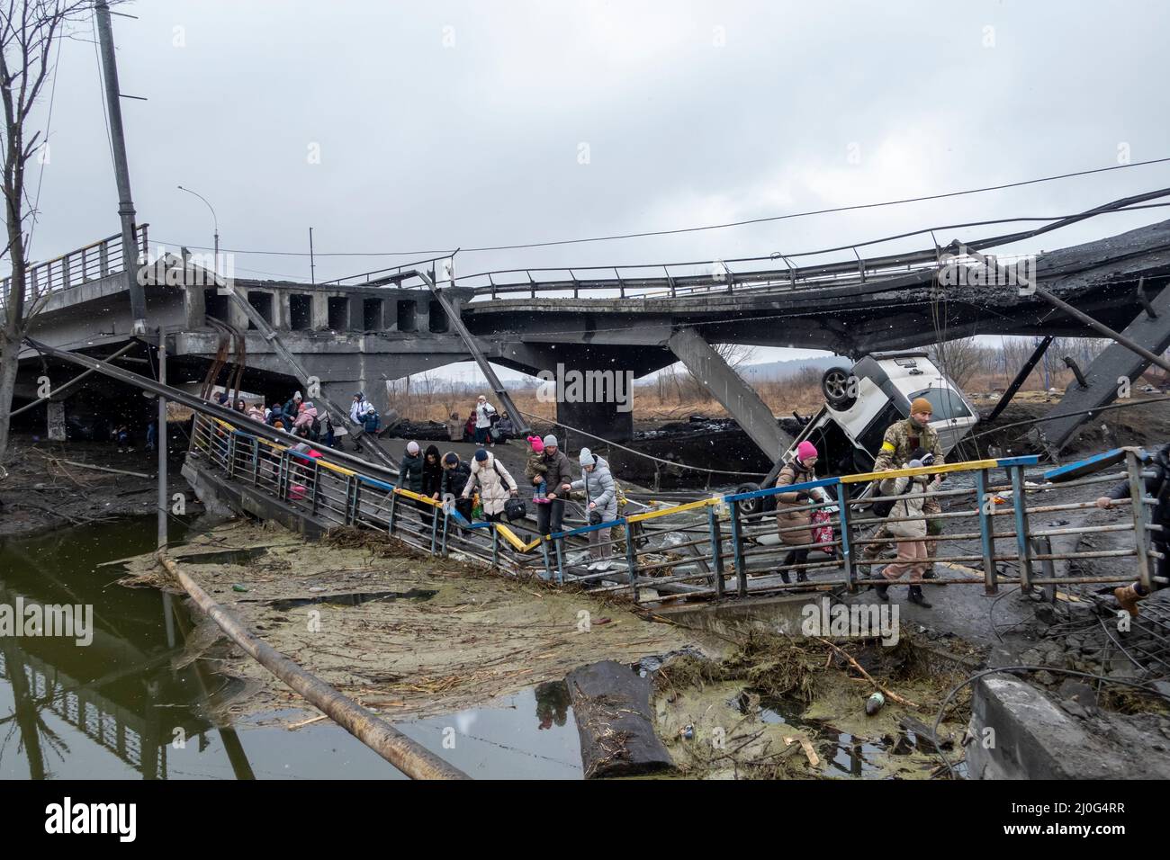 Helping to cross a bridge hi-res stock photography and images - Alamy