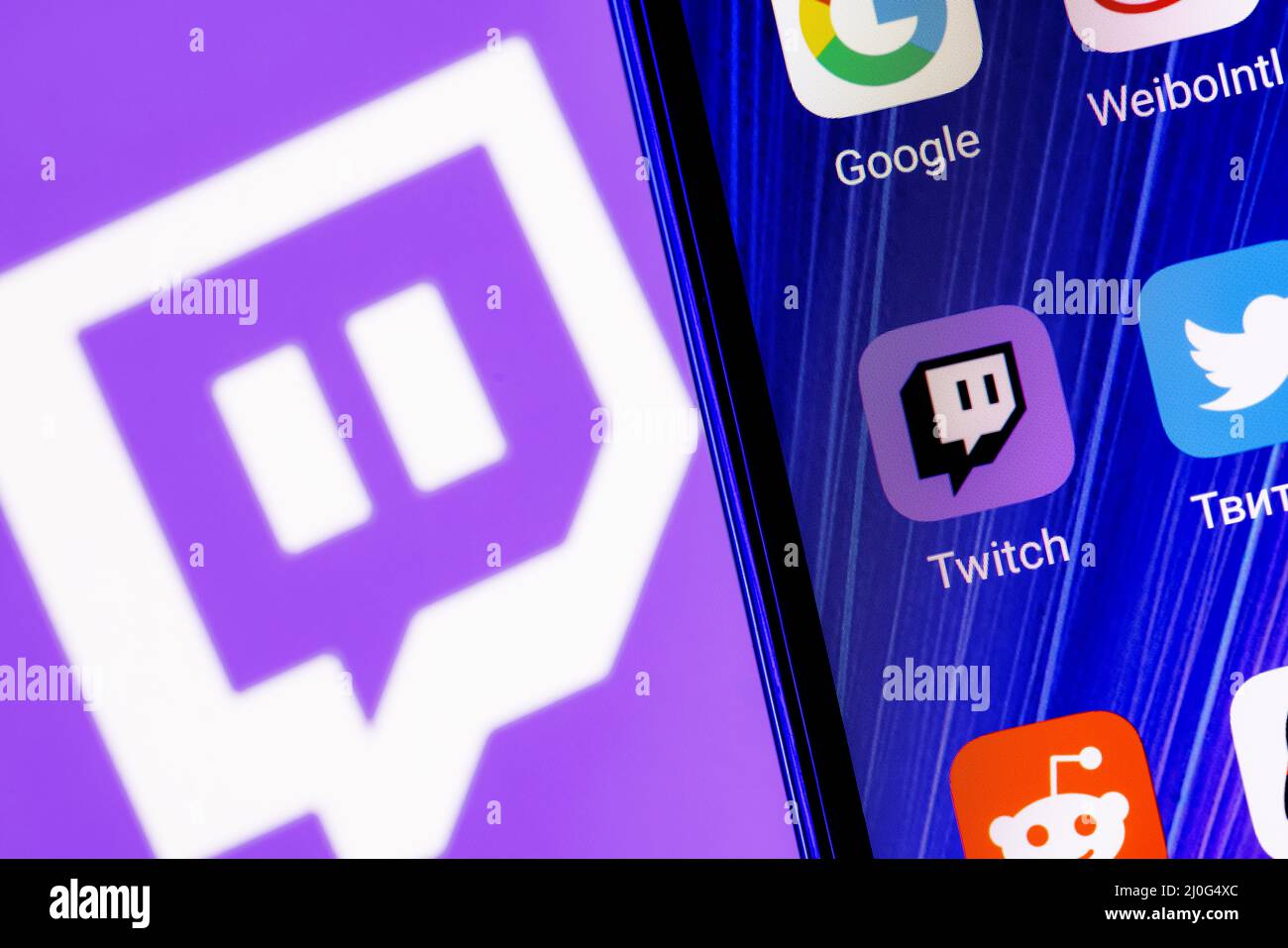 The icon of the Twitch live streaming service application among other ...