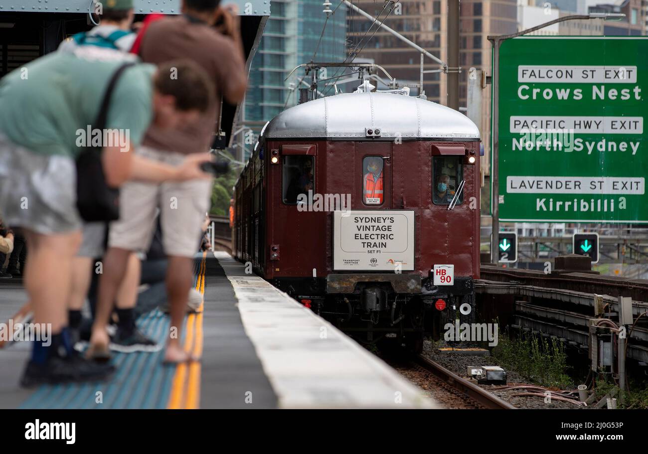 Sydney. 19th Mar, 2022. A vintage train passes Harbour Bridge in Sydney ...