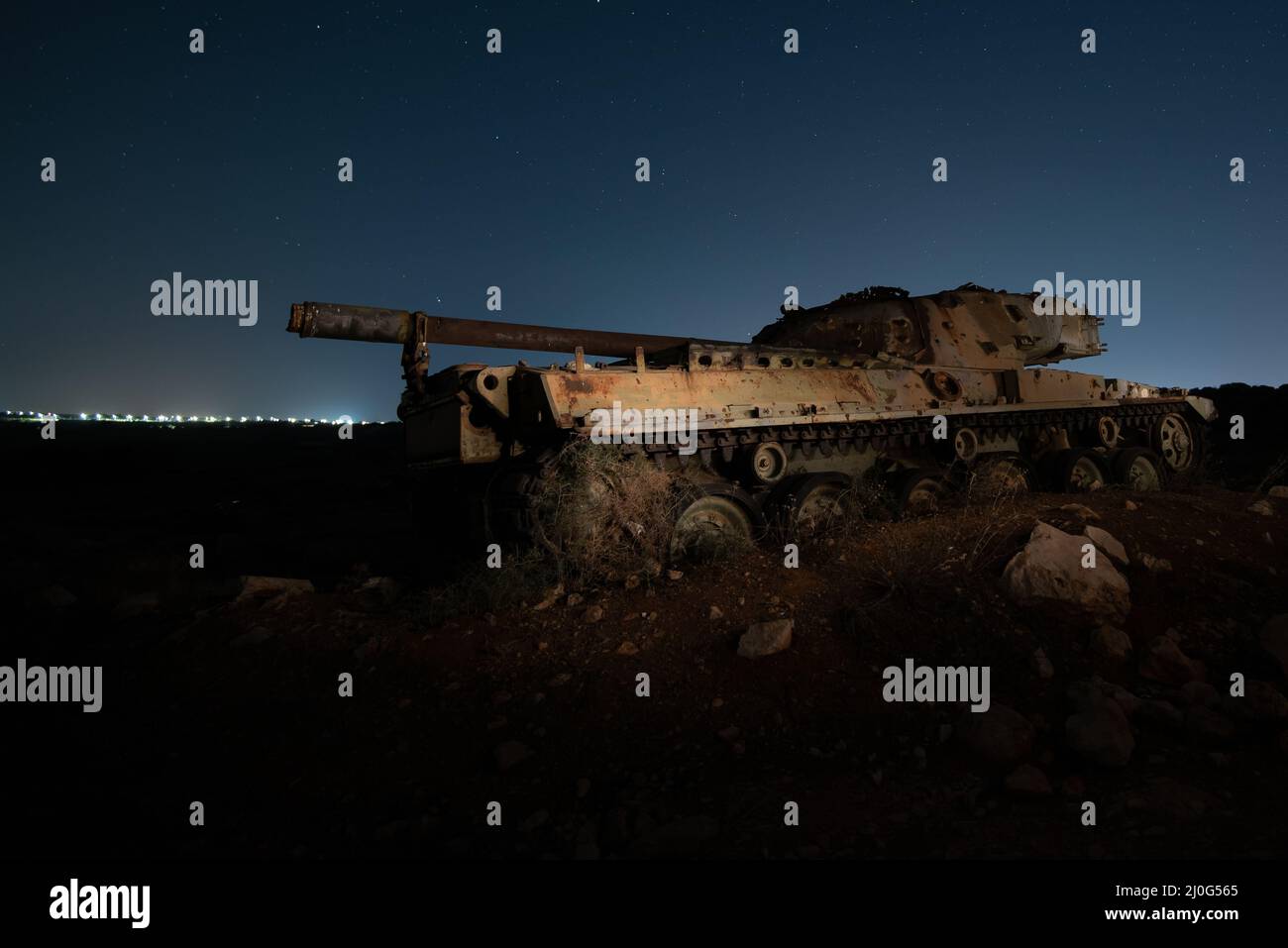 Abandoned military army tank vehicle at night Stock Photo - Alamy