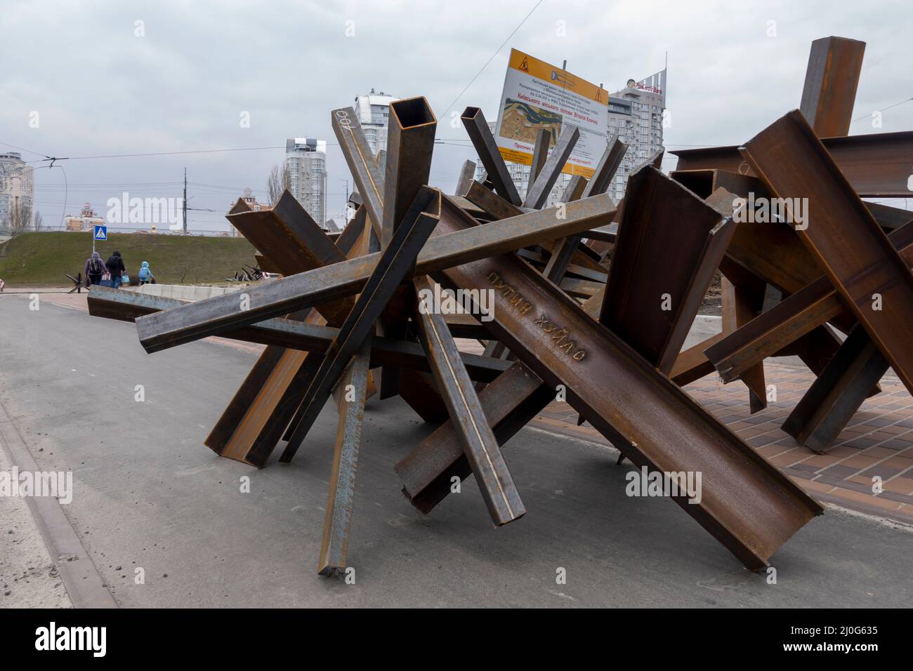 KYIV, UKRAINE 06 March. Anti-tank hedgehogs with a writing " "Putin ...