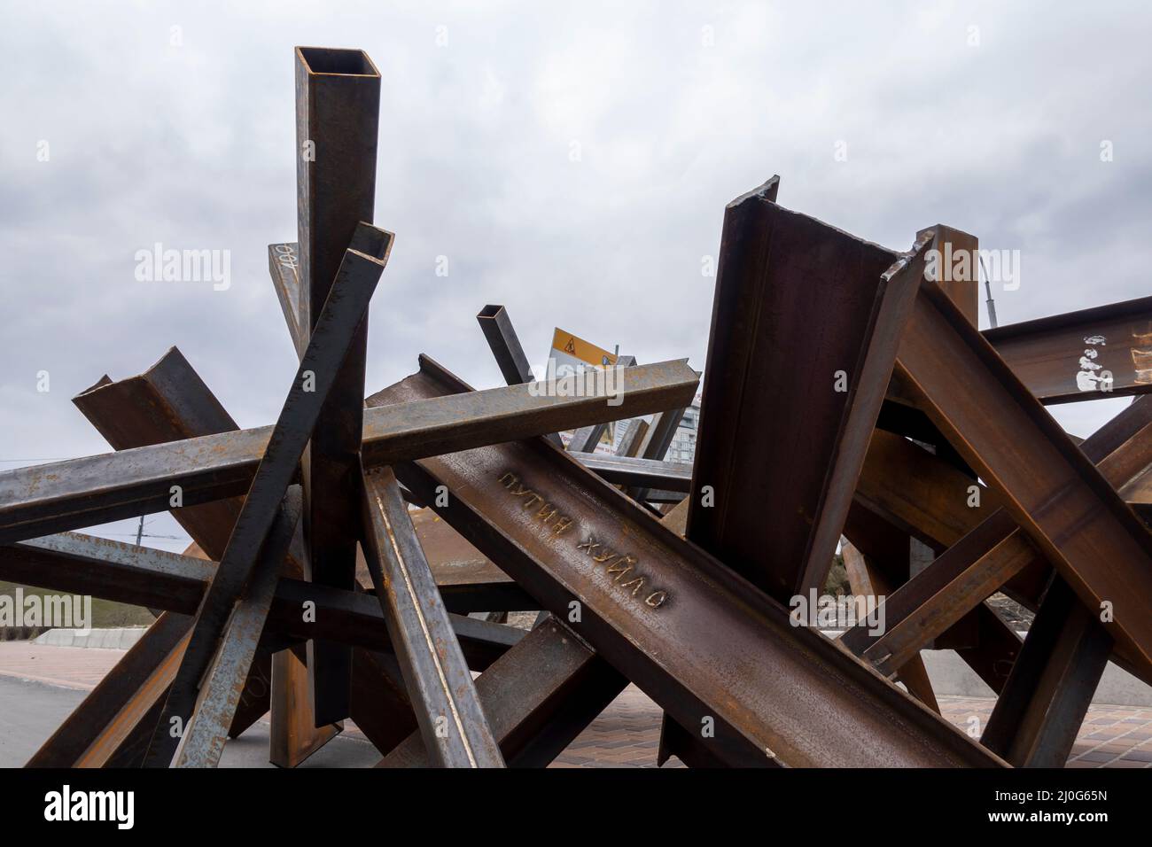 KYIV, UKRAINE 06 March. Anti-tank hedgehogs with a writing " "Putin ...