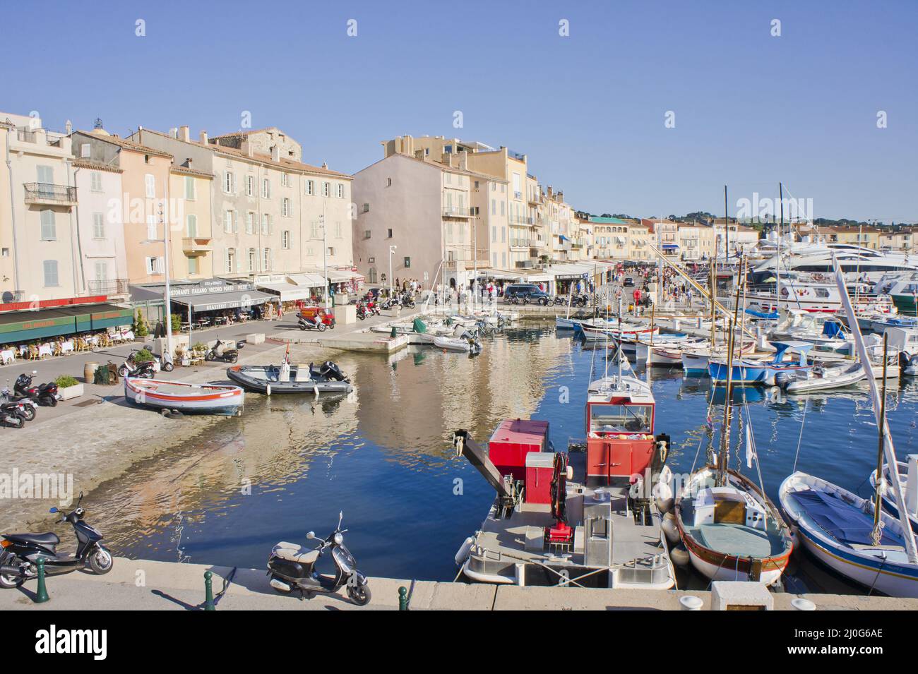 Saint Tropez, Old port view with fishing boats and colorful houses, CÃ ...