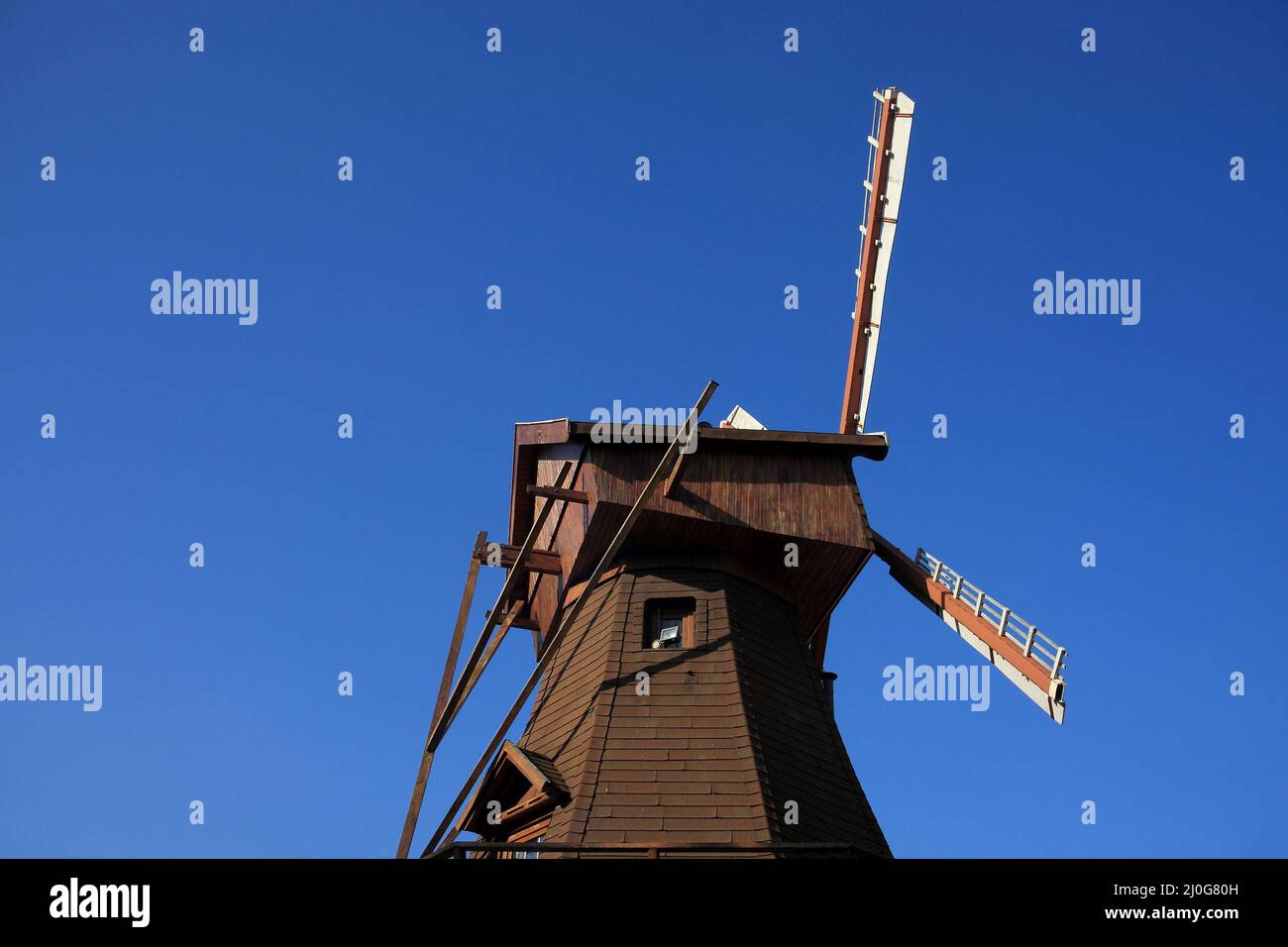 Windmill at the side Stock Photo - Alamy