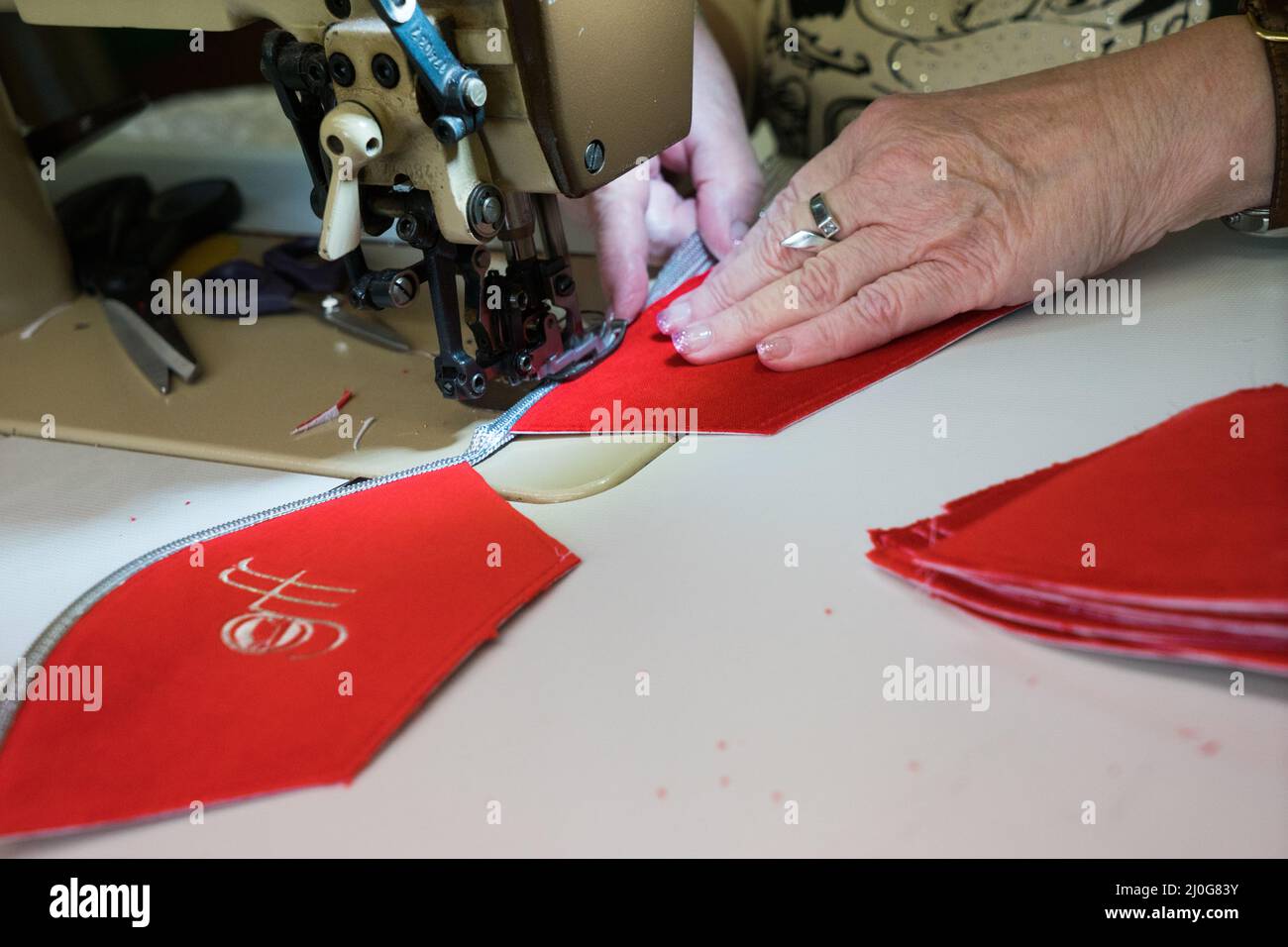 Making fool's caps for the carnival Stock Photo - Alamy