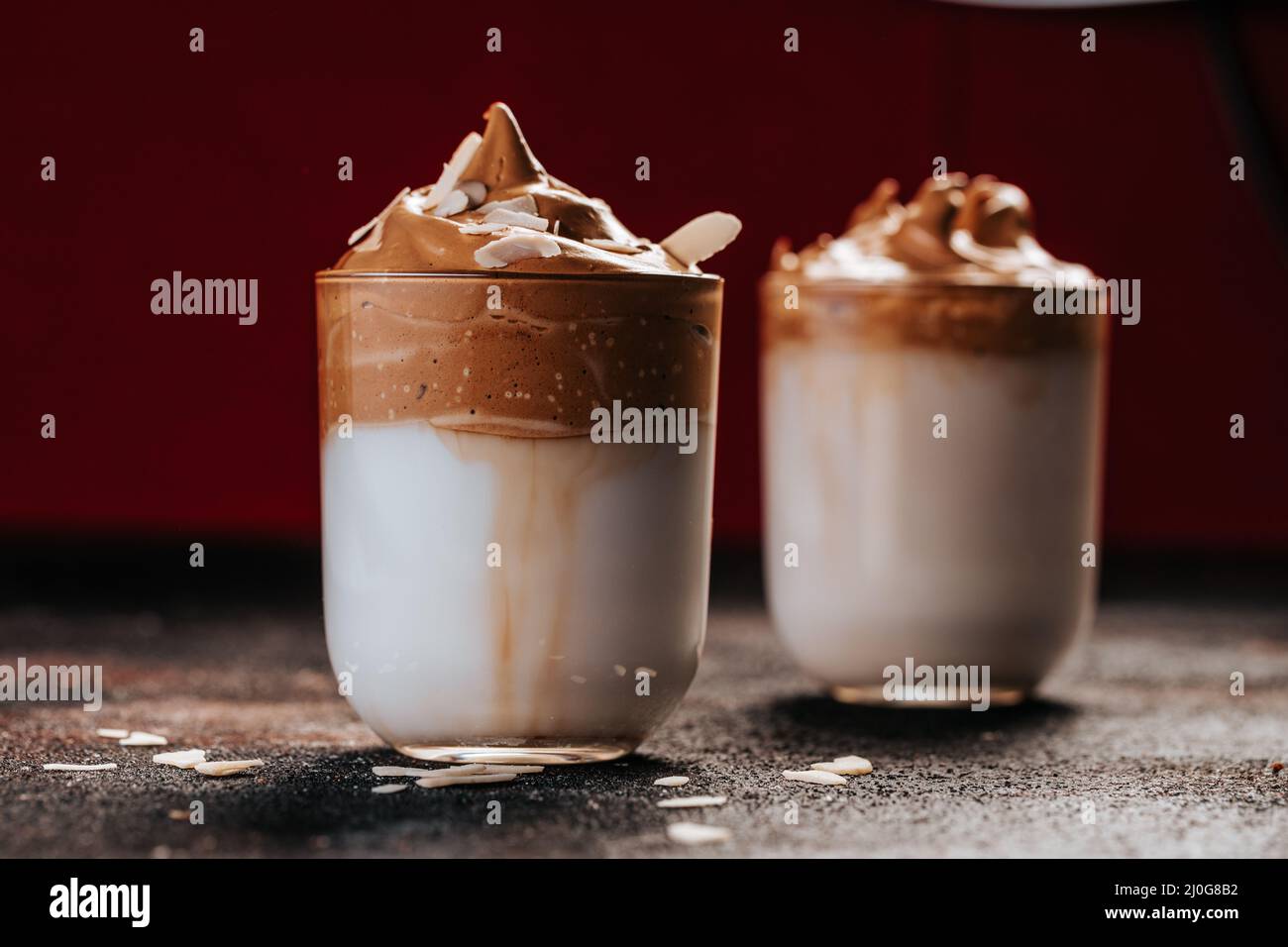 Instant cream coffe or dalgona with almond and cinnamon Stock Photo - Alamy