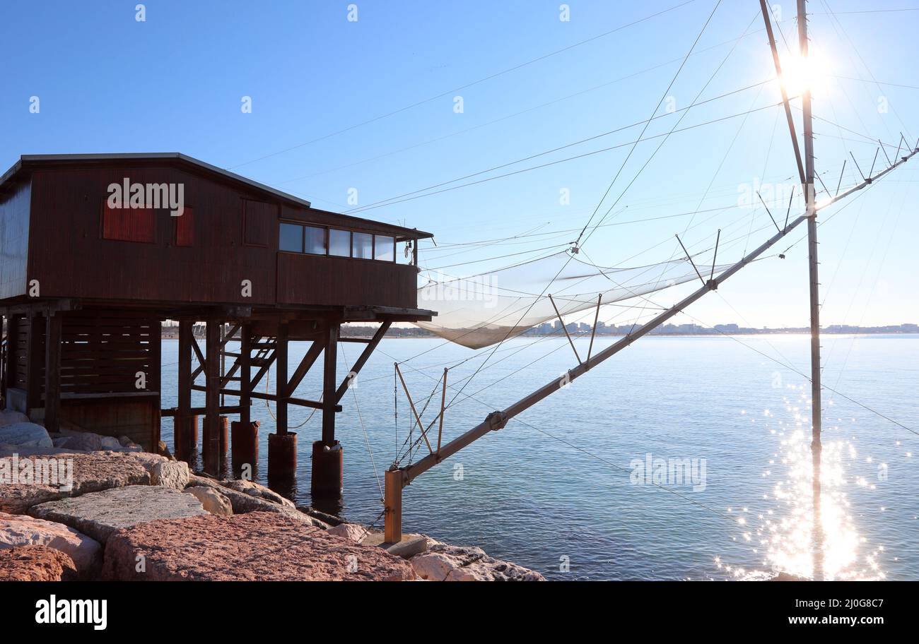 wooden fishing shed with very huge nets on the sea Stock Photo - Alamy