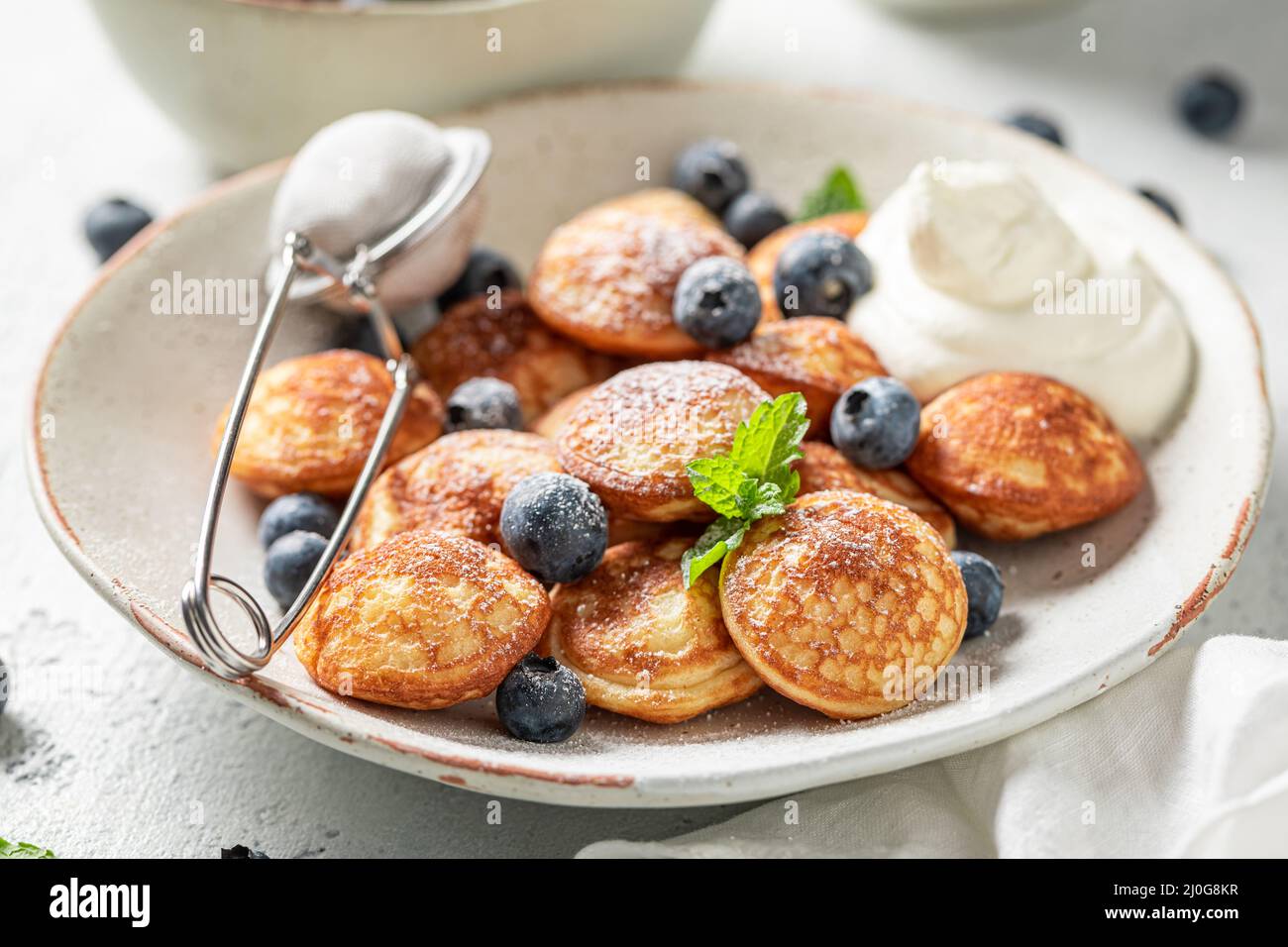 Dutch and sweet mini pancakes as a sweet perfect snack. Breakfast with ...