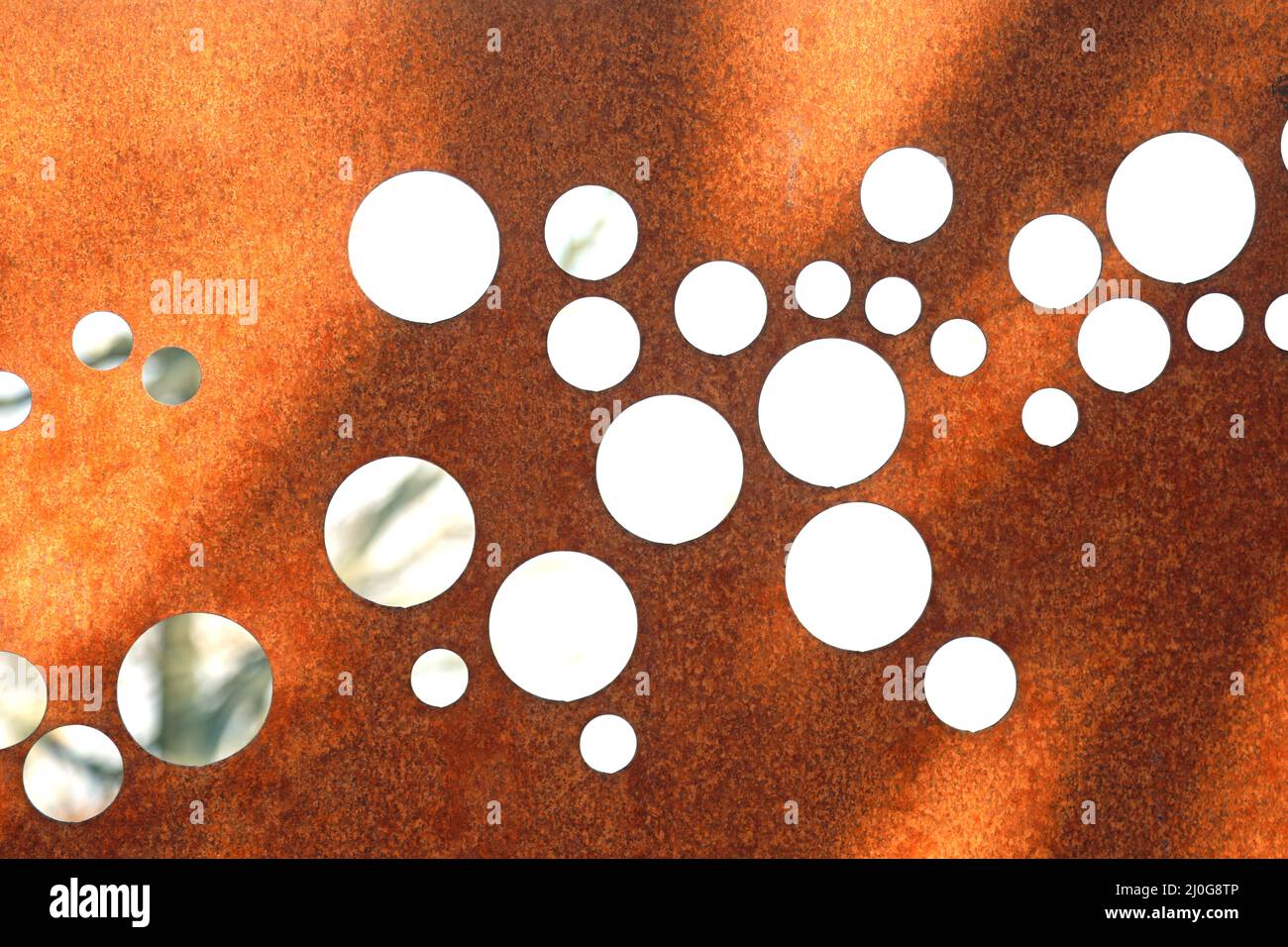 many small circles in the rusted metal Stock Photo - Alamy