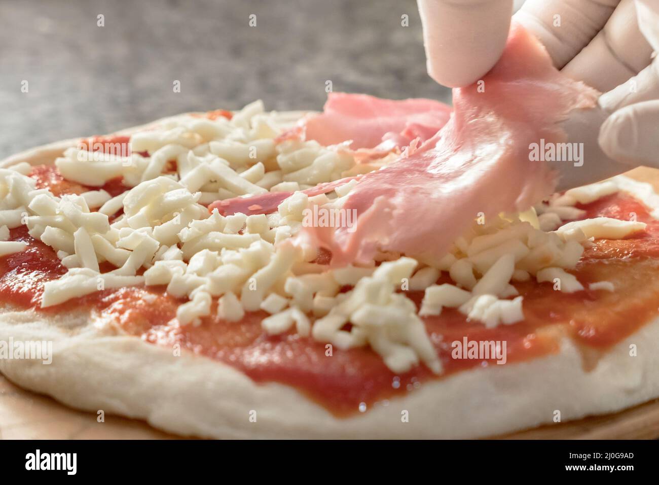 Authentic Italian delicious Pizza with Ham Stock Photo - Alamy