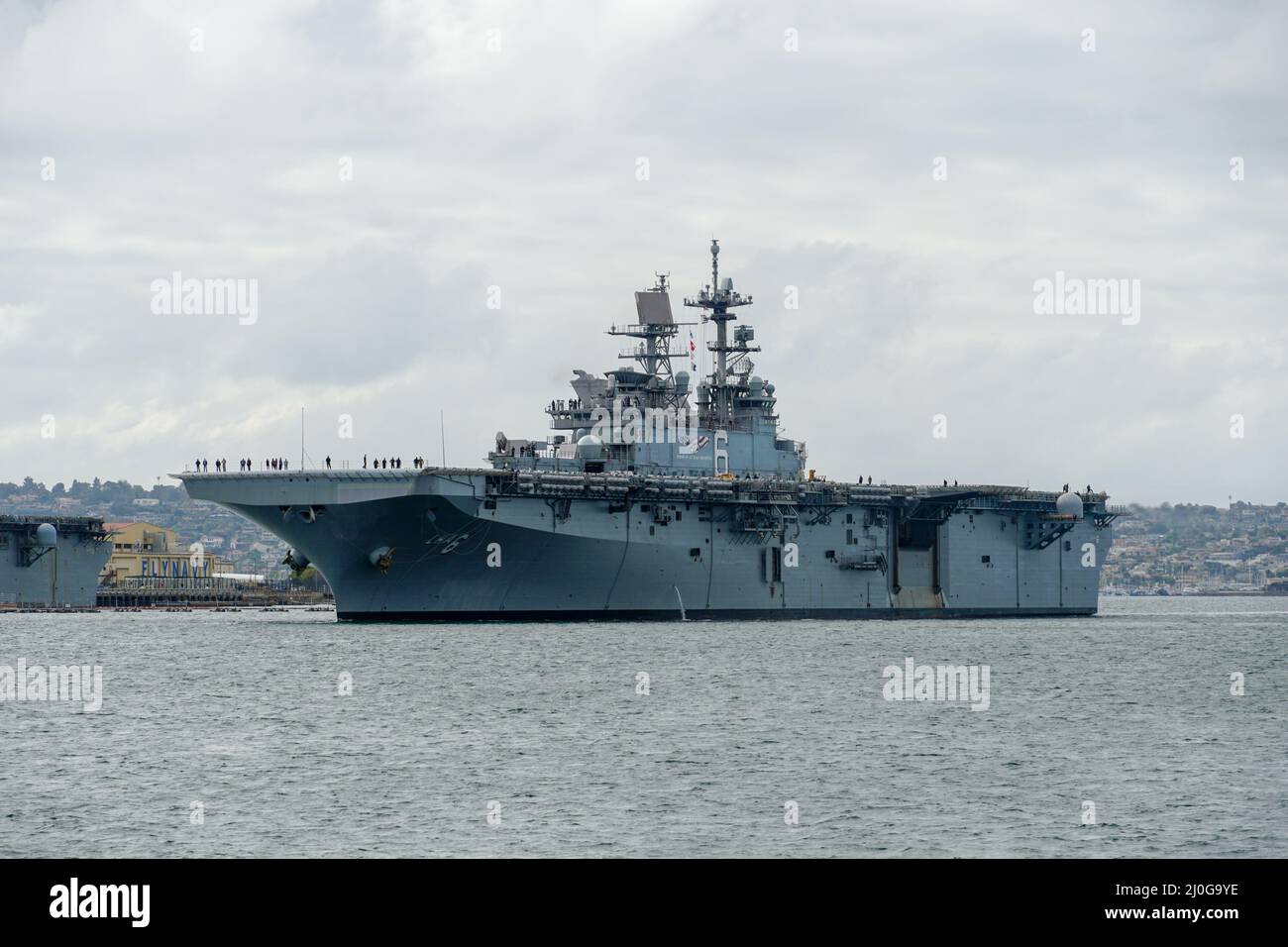 Nuclear aircraft carrier leaving San Diego Bay. USS Midway Stock Photo ...