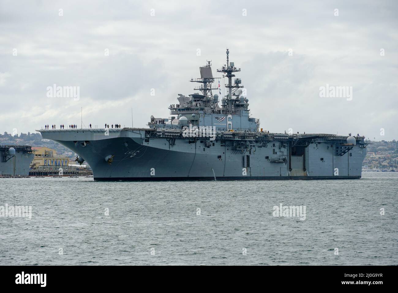 Nuclear aircraft carrier leaving San Diego Bay. USS Midway Stock Photo ...