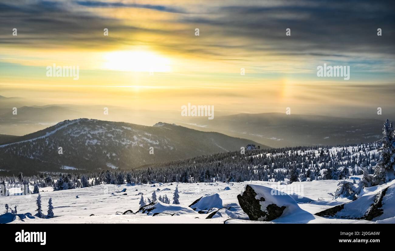 Winter sunset in the mountains Stock Photo - Alamy