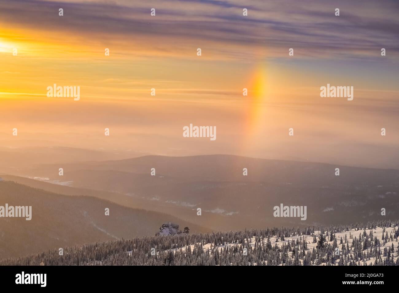 Winter sunset in the mountains Stock Photo - Alamy