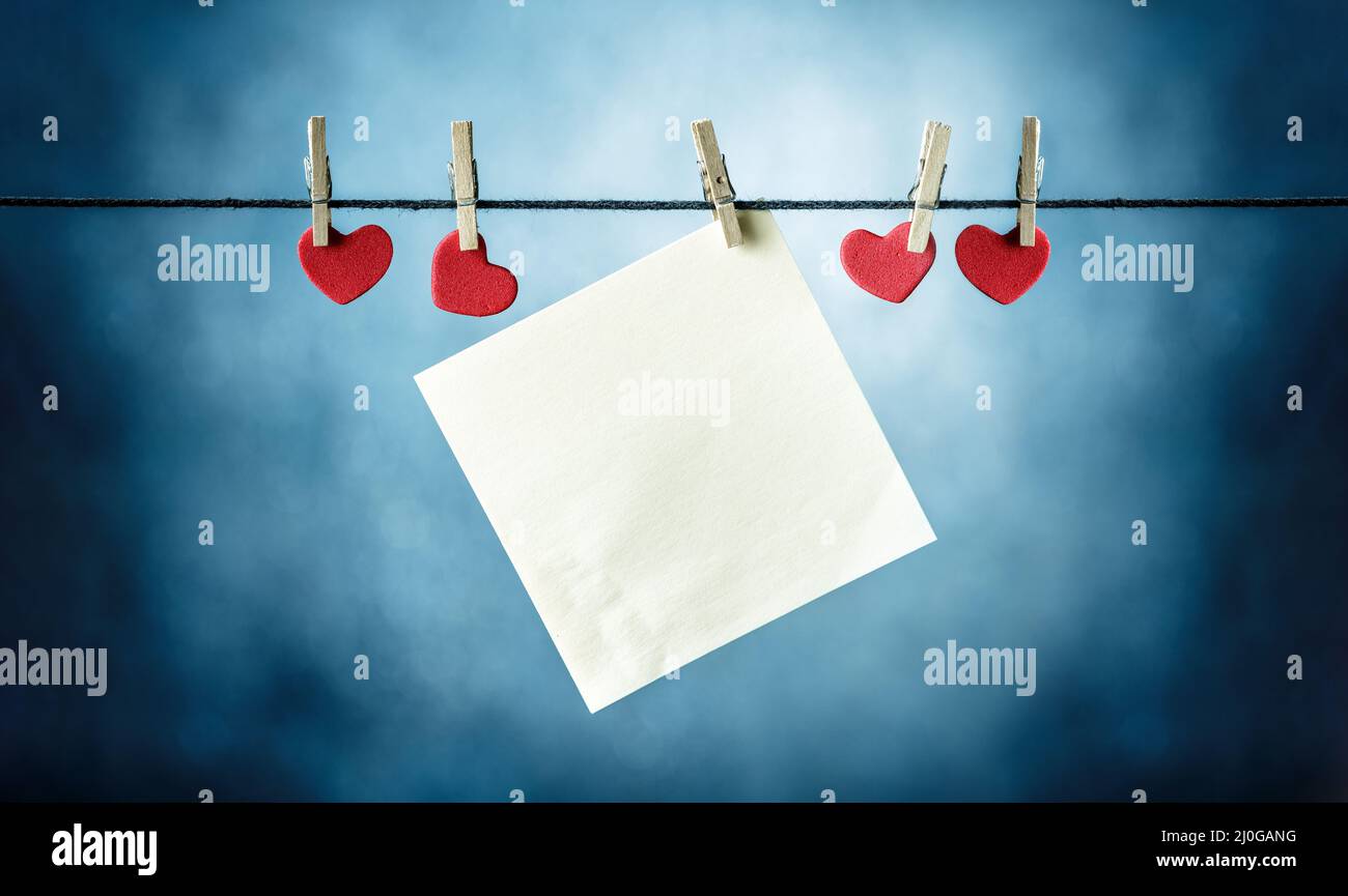 Cards hanging on ribbon hi-res stock photography and images - Alamy
