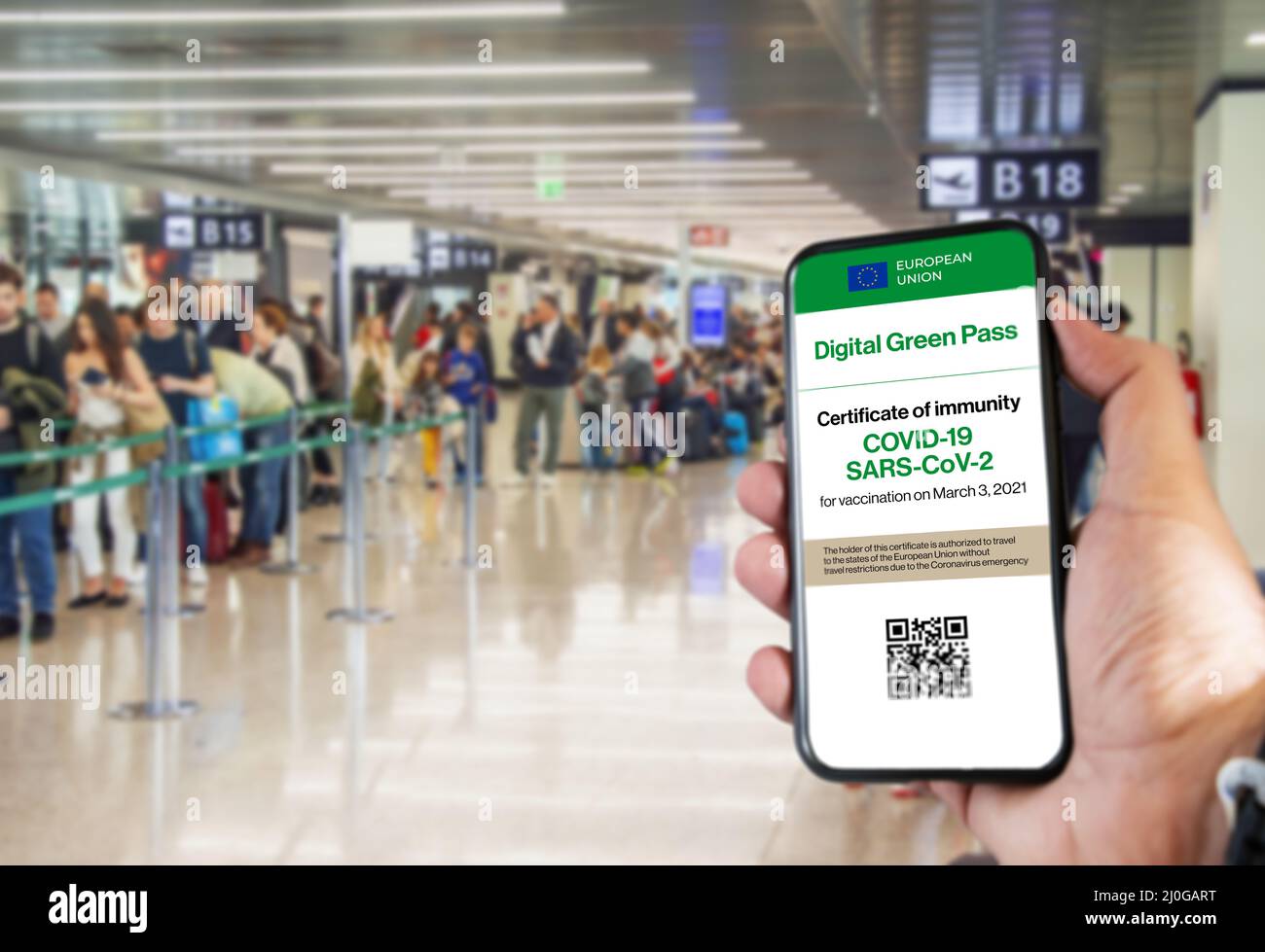 The digital green pass of the european union with the QR code on the ...