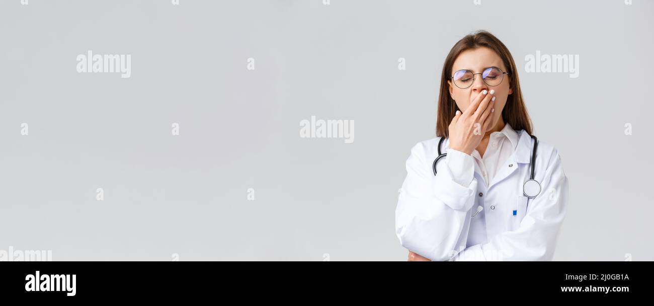 Female nurse working hard hi-res stock photography and images - Alamy