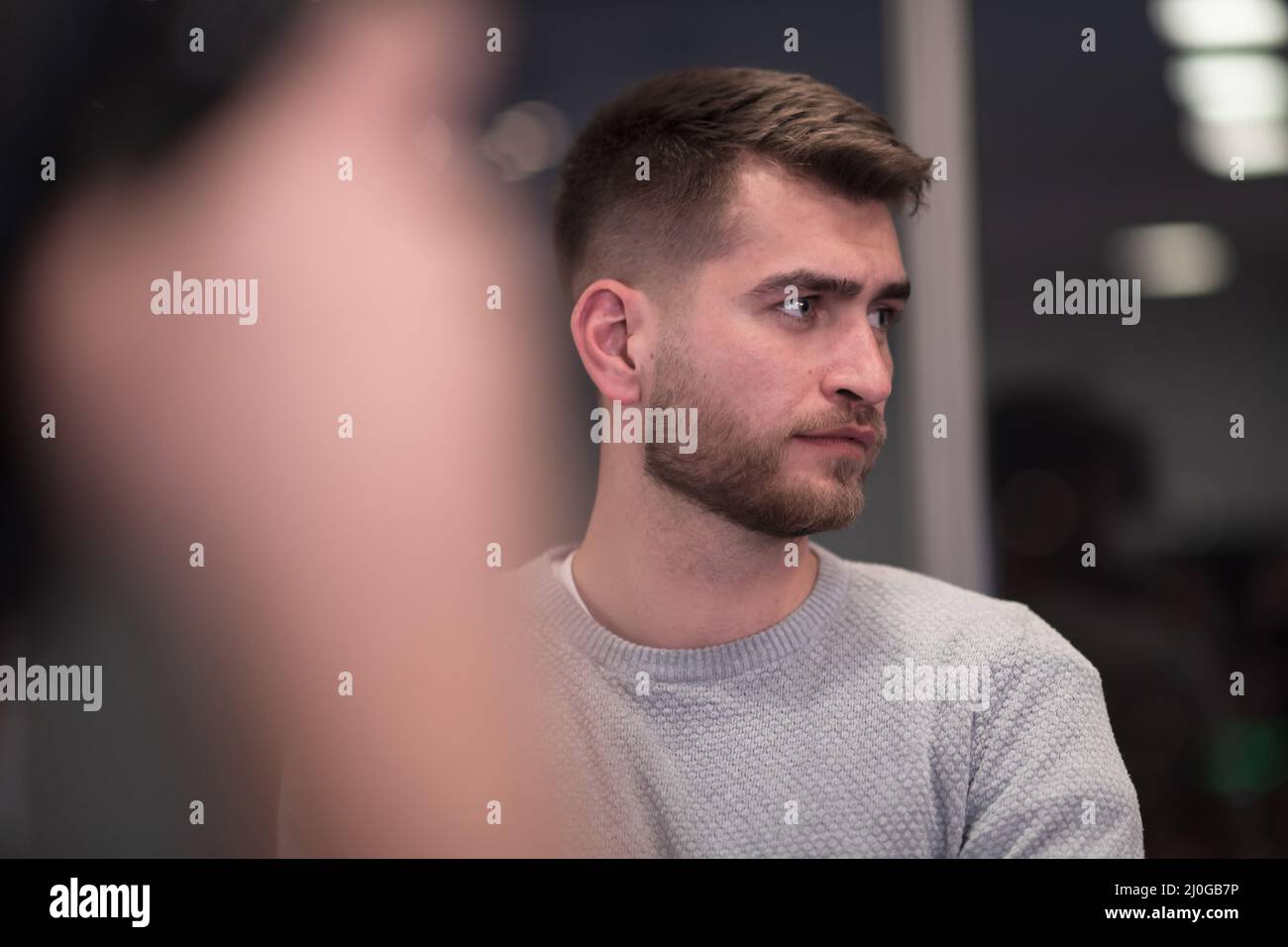 Portrait of happy millennial male business owner in modern office ...