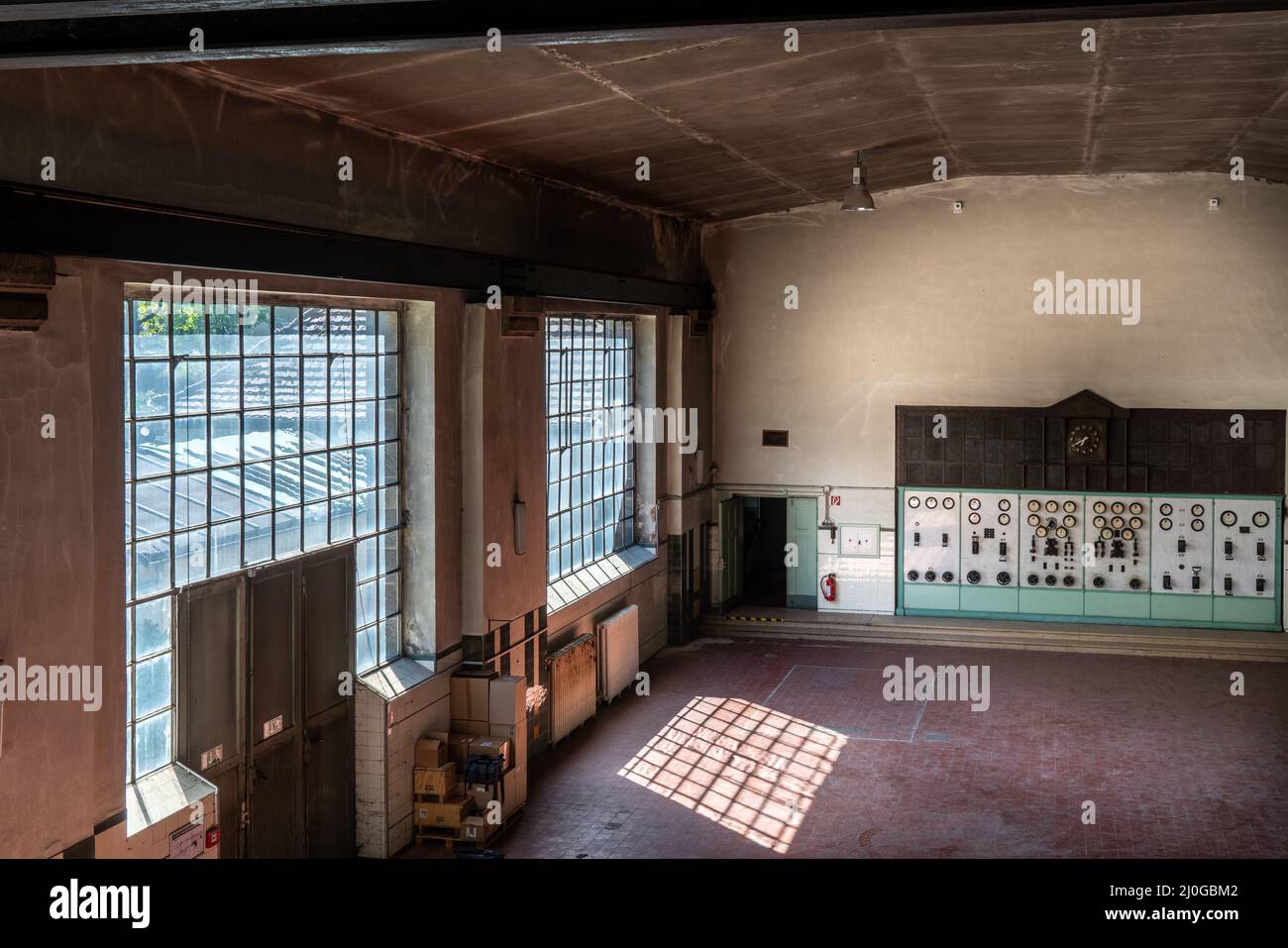 Machine hall and control panel in a historic power plant Stock Photo ...