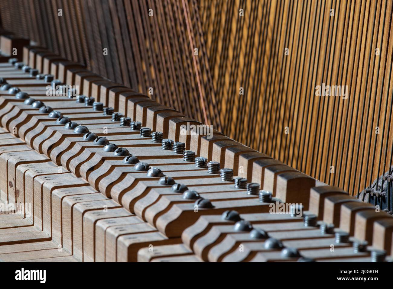 Keyboard mechanics of a piano Stock Photo - Alamy