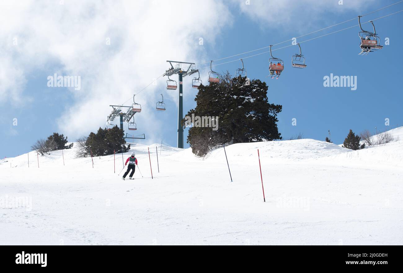 Skier athletes skiing at troodos mountains during ski competition in ...