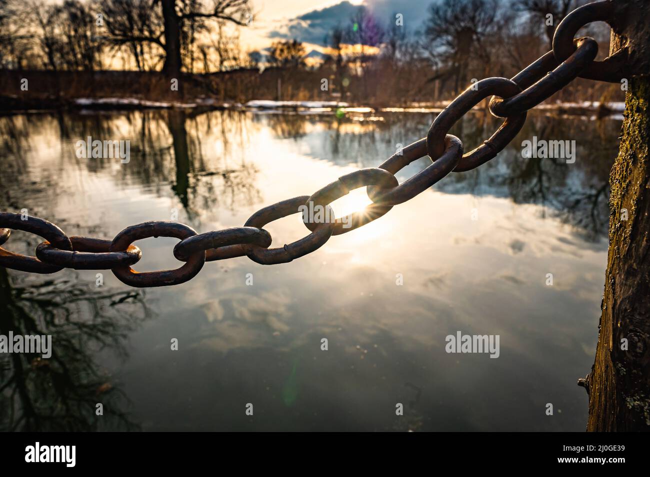 Old wooden pier with chain Stock Photo - Alamy