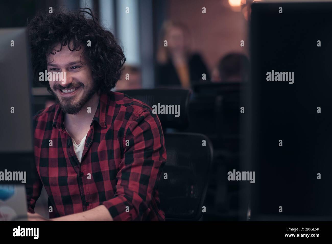 Smiling businessman wearing headset having virtual team meeting group ...