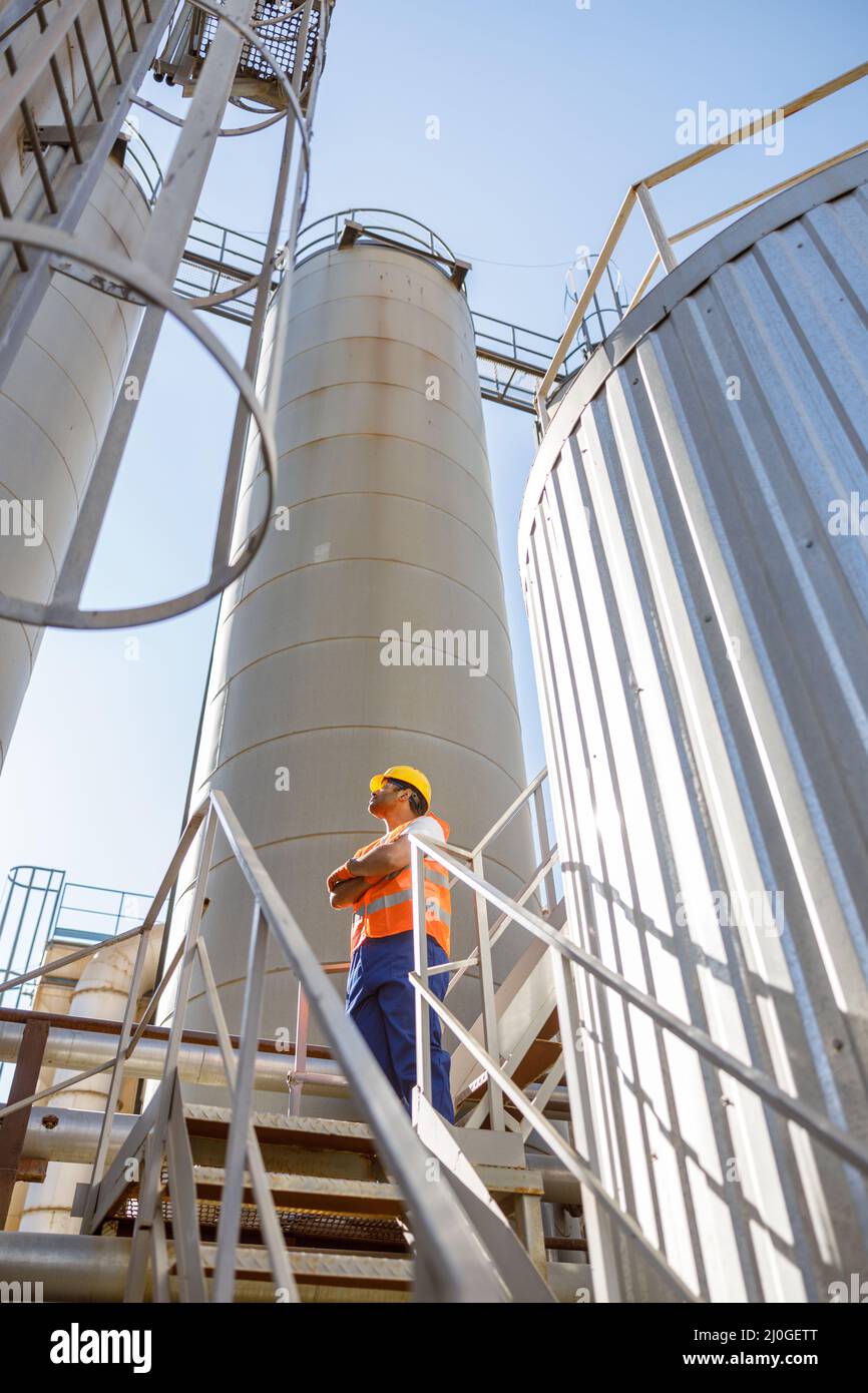 Construction industry worker working at manufacturing facility Stock ...