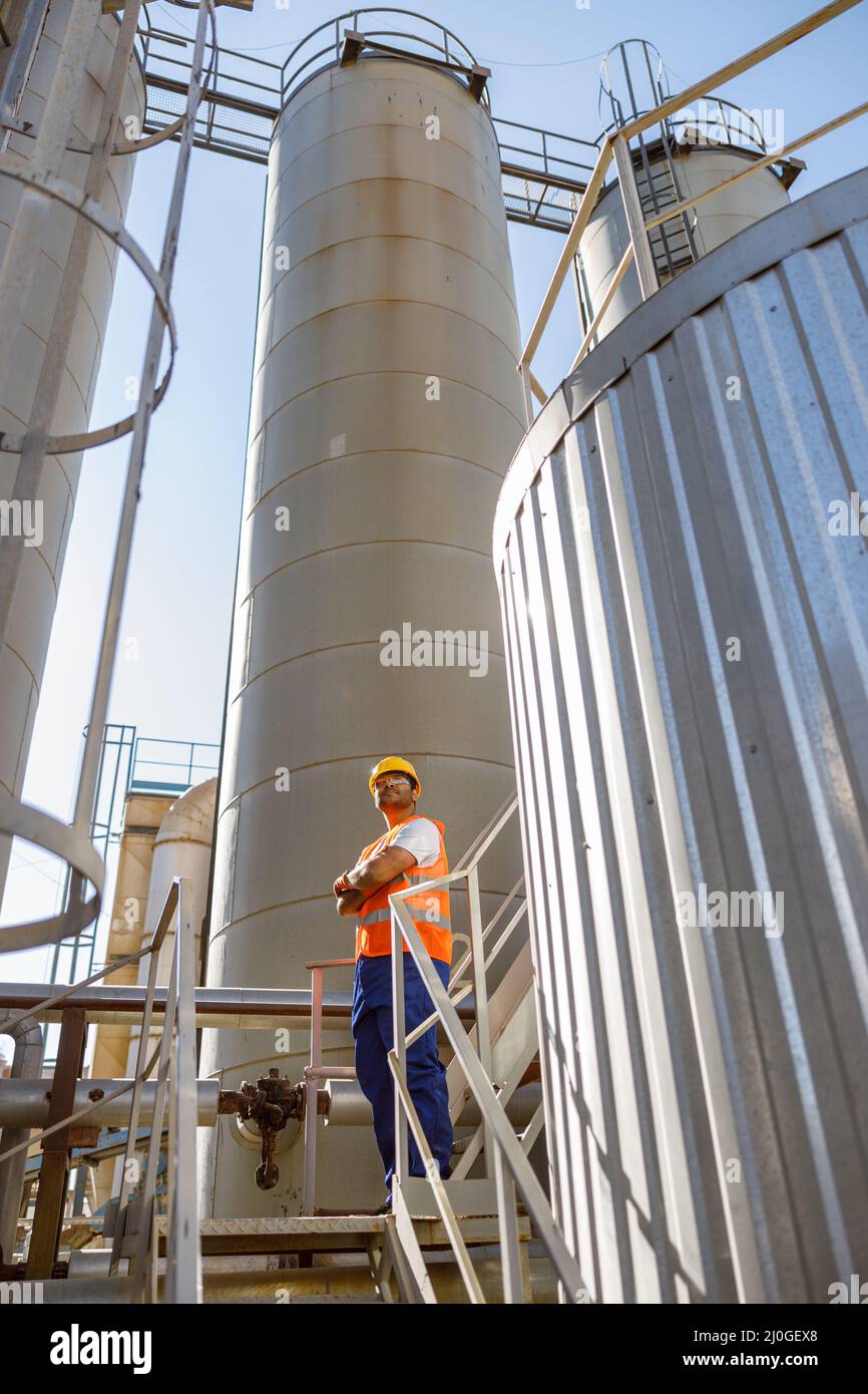 Industrial worker on his job at construction plant Stock Photo - Alamy