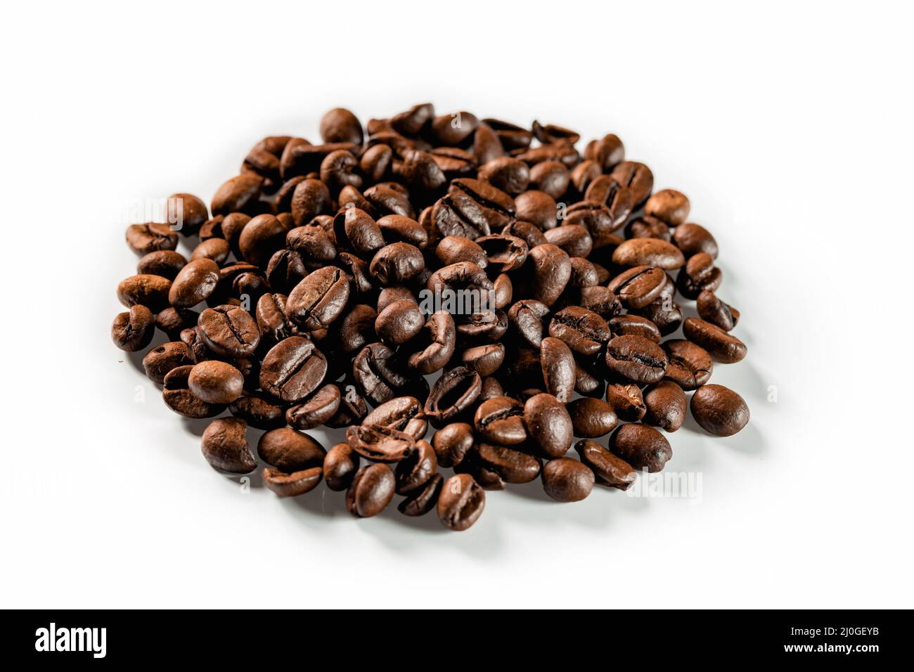 Roasted coffee ground on isolated white background Stock Photo - Alamy