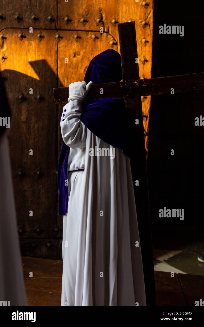 Carrying a cross on their back hi-res stock photography and images - Alamy