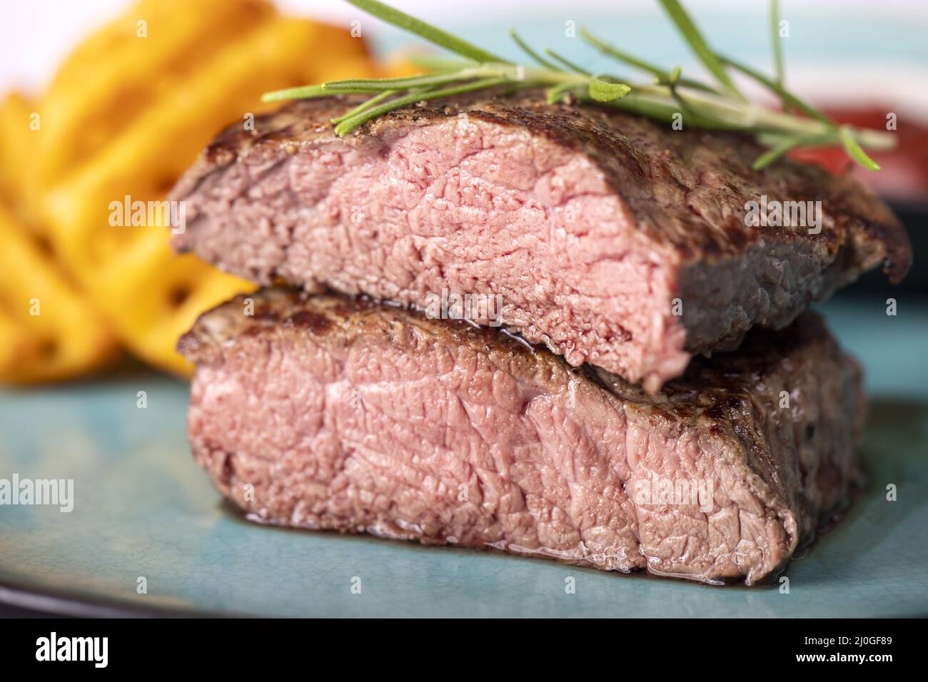 Grilled steak with fresh potato grids Stock Photo - Alamy