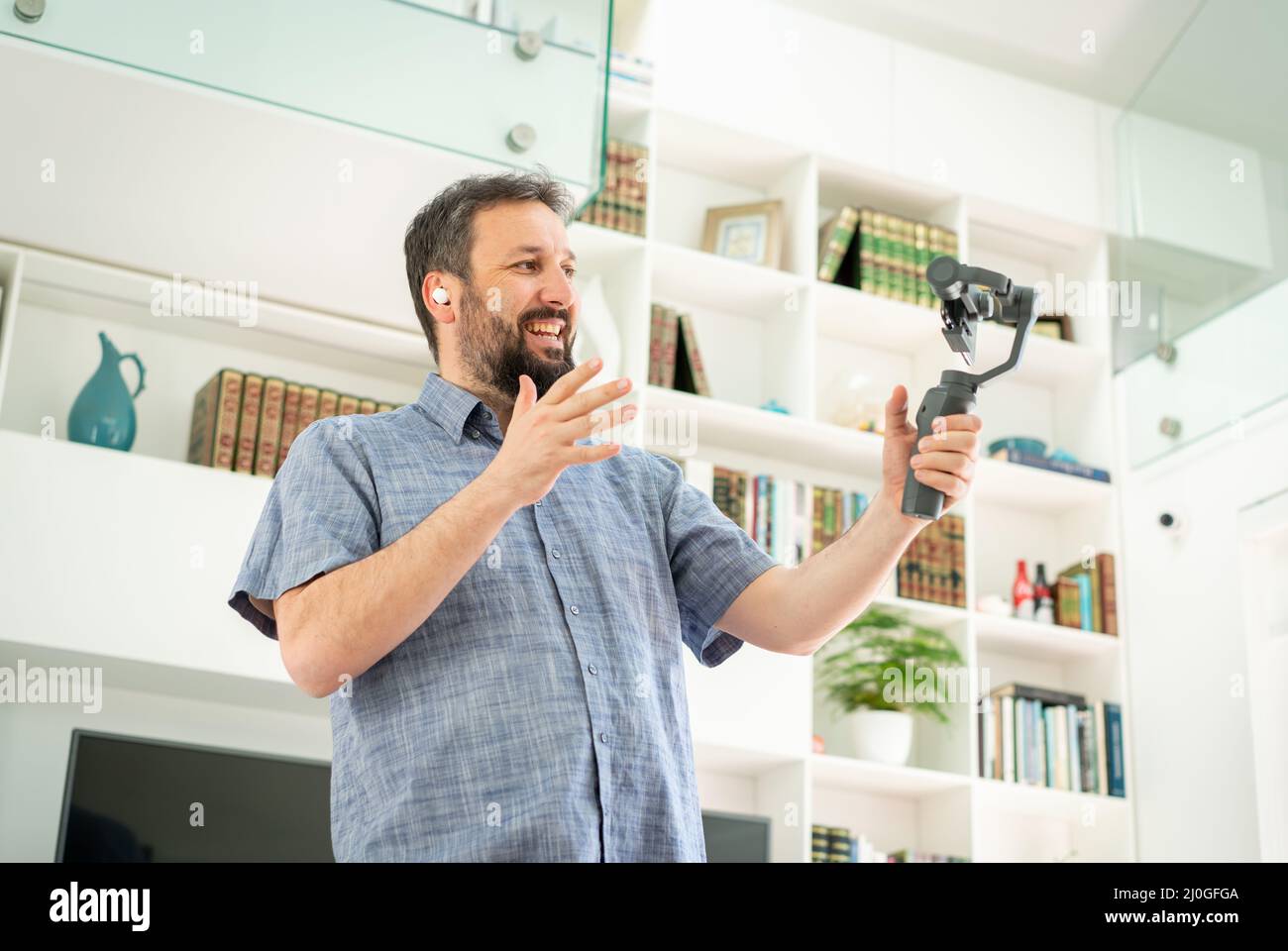 Adult male vlogger streaming online Stock Photo - Alamy