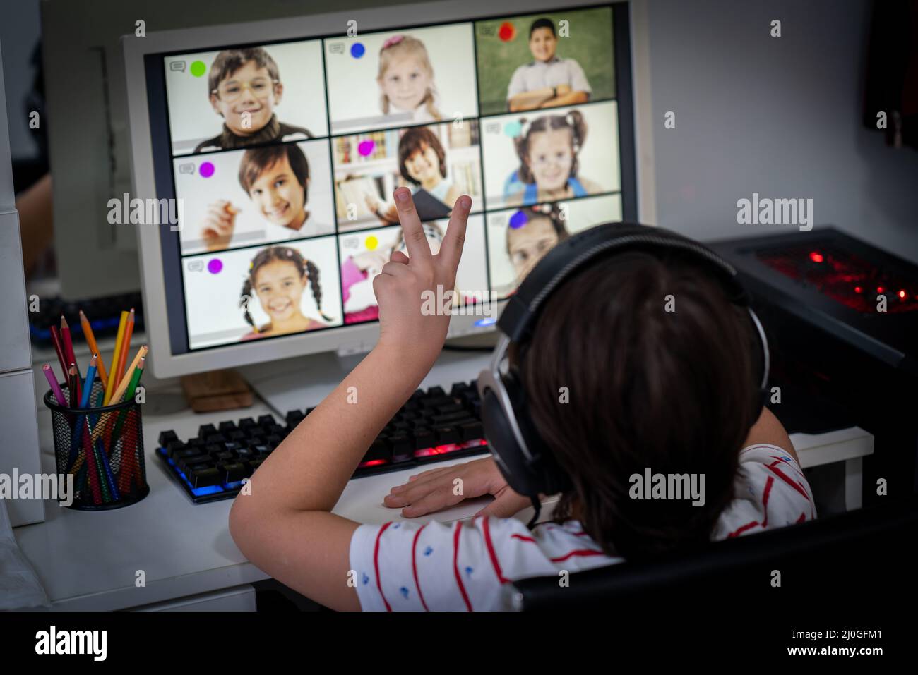Little boy having online school distance learning class at home Stock ...