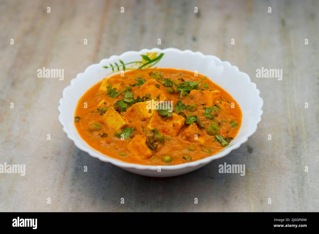 Famous Indian dish "matar paneer" is ready to serve Stock Photo - Alamy