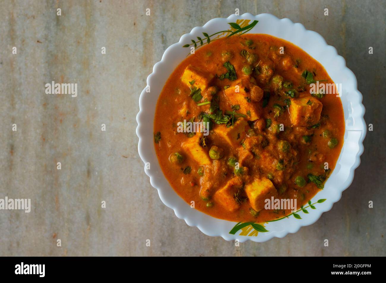Famous Indian dish "matar paneer" is ready to serve Stock Photo - Alamy