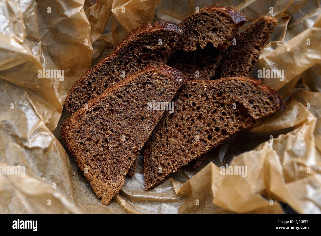 grilled rye bread toasts on craft paper Stock Photo - Alamy