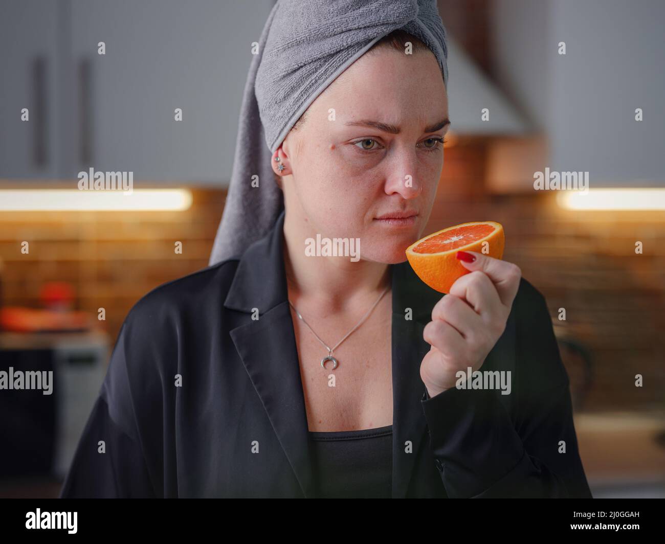 Sick woman trying sense smell hi-res stock photography and images - Alamy