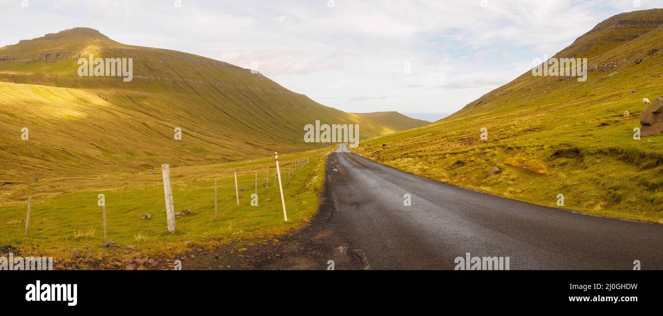 A winding road in the Faroe Islands. The road network on the Faroe ...