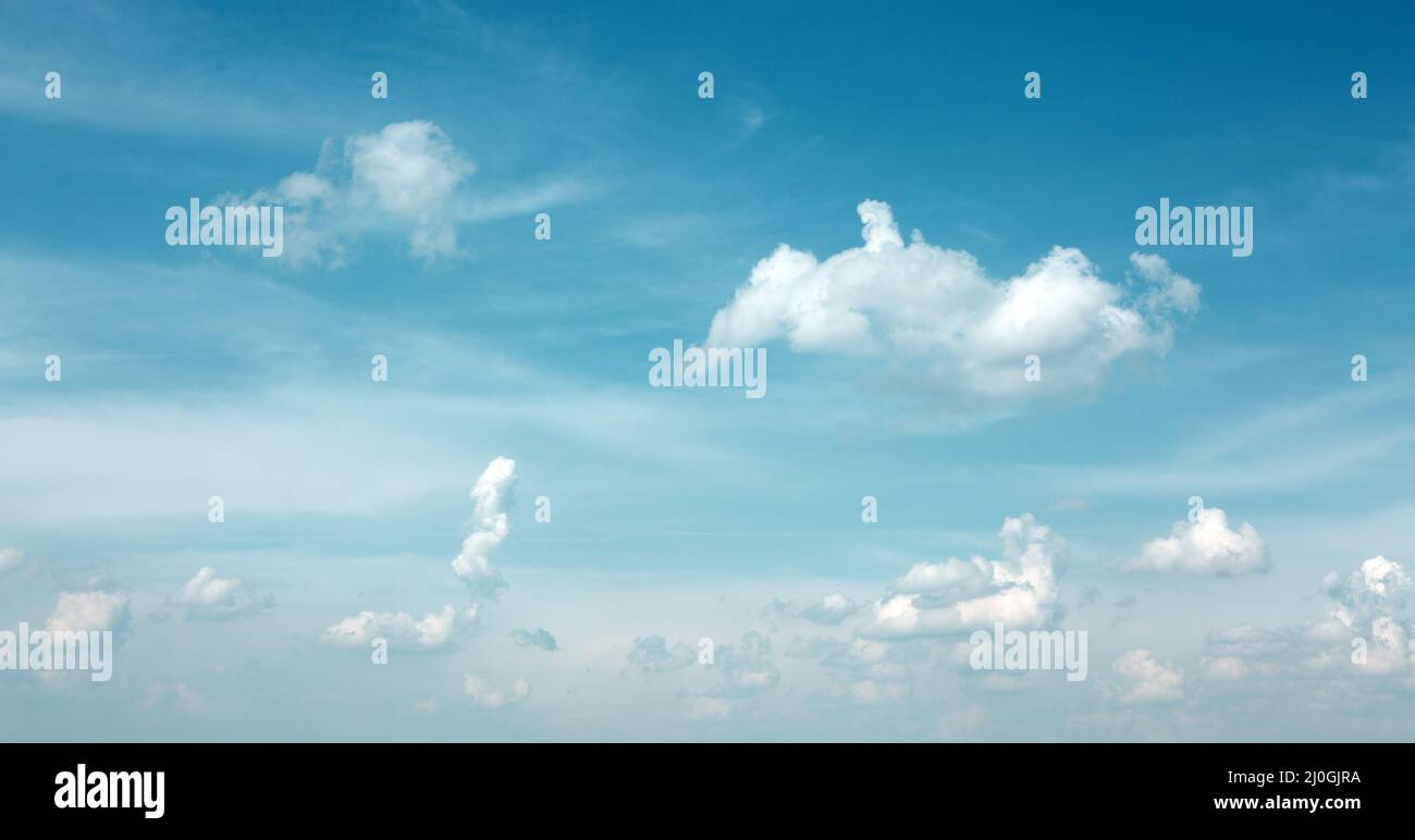 Blue sky background with white clouds Stock Photo - Alamy