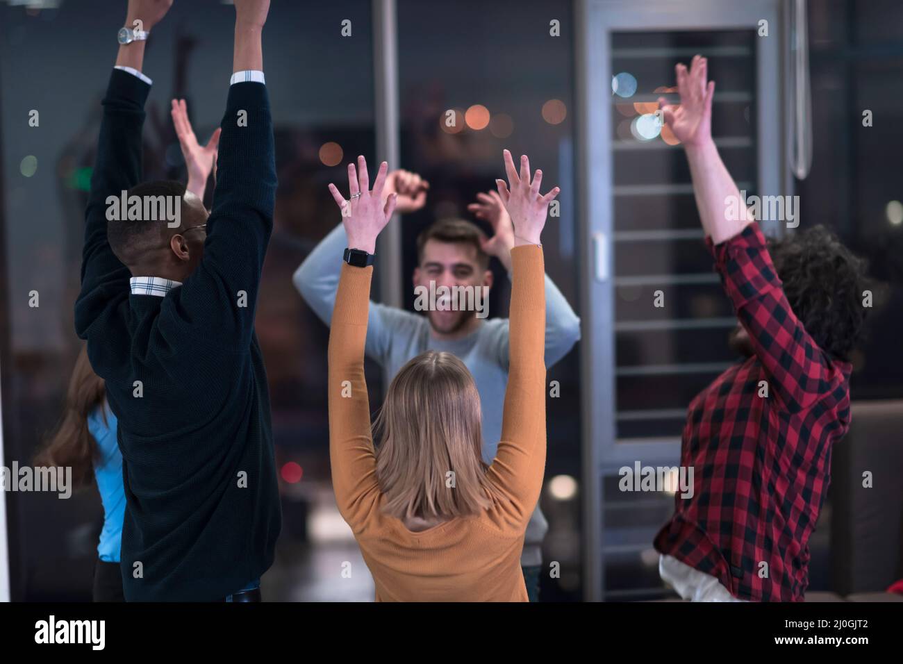 Diverse coworkers engaged in fun hi-res stock photography and images ...