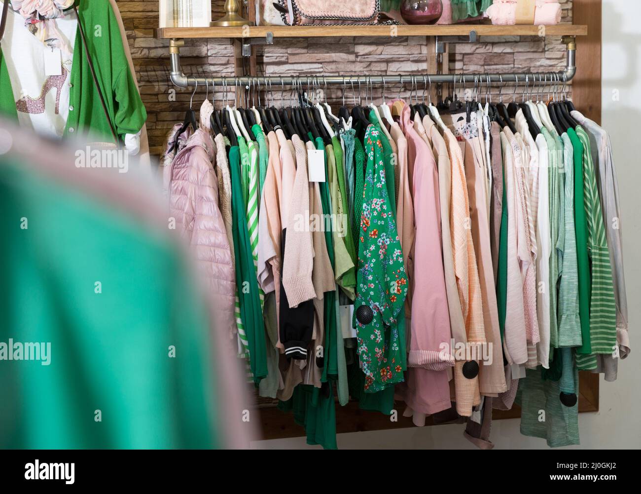 Image of collection clothes in the showroom Stock Photo - Alamy