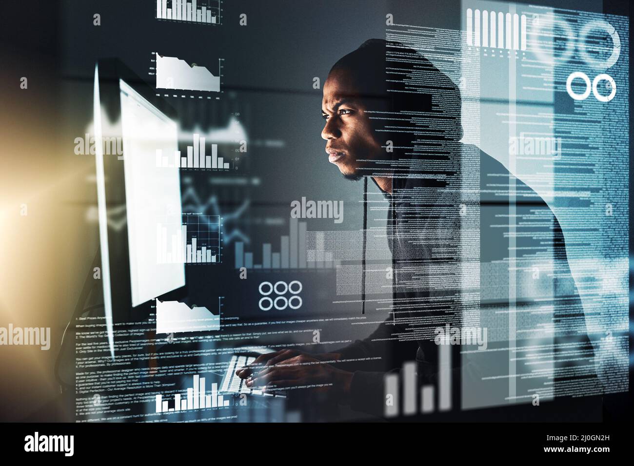 Hes got his eyes on your data. Shot of a hacker cracking a computer code in the dark Stock Photo ...