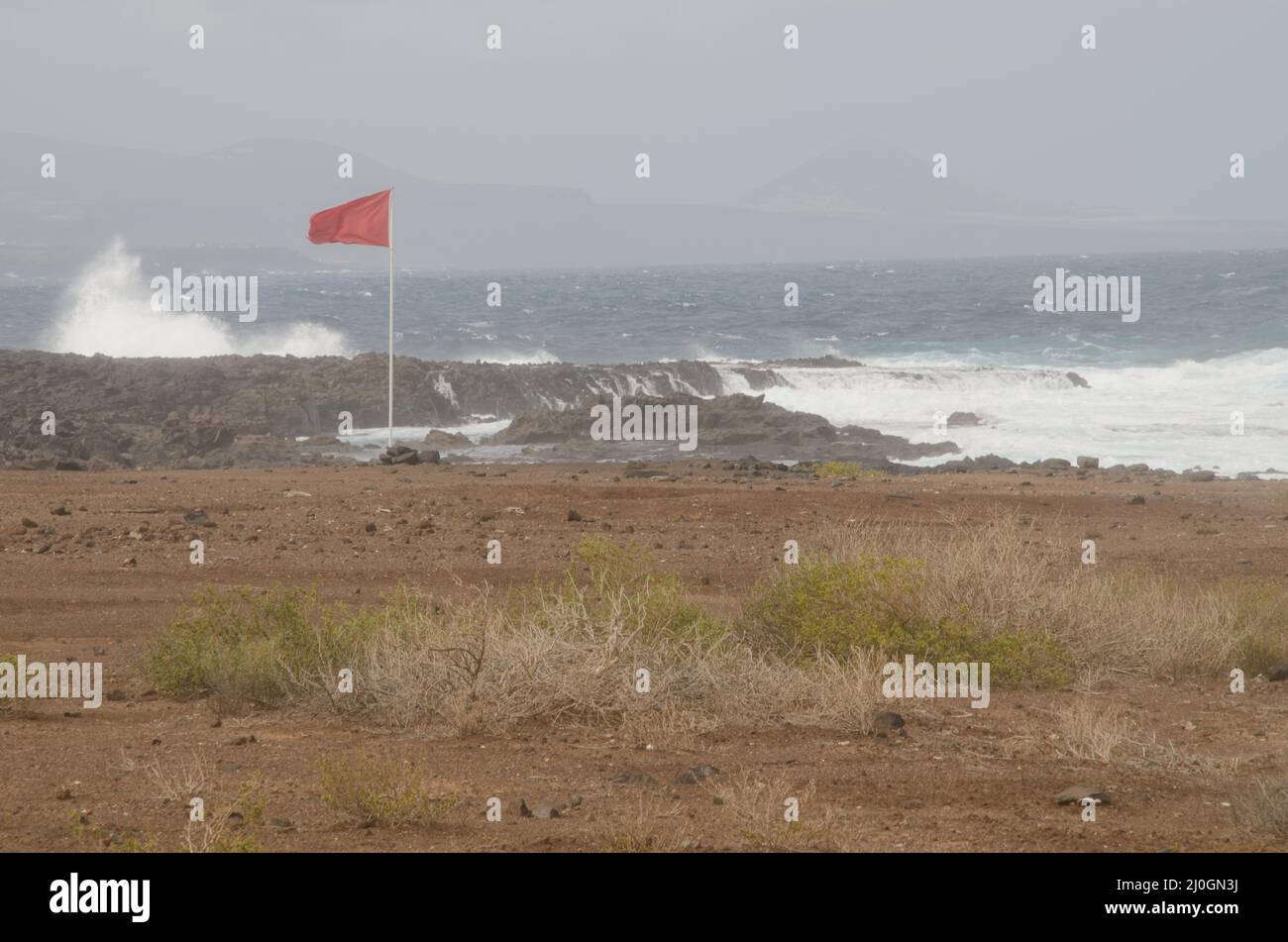 Flag prohibiting swimming in rough seas. El Confital. La Isleta ...