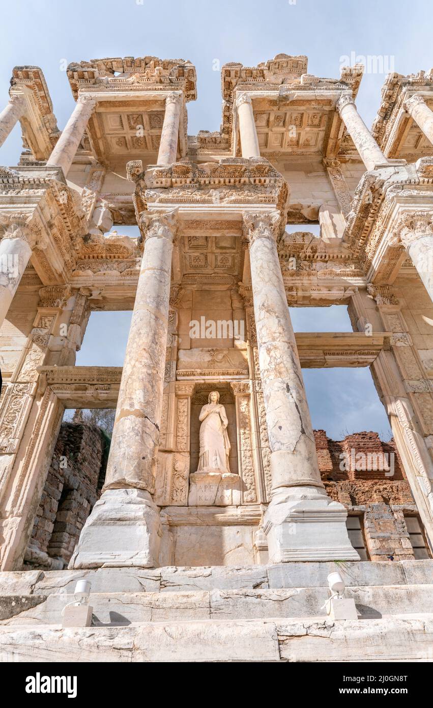 Celsus Library in Ephesus in Selcuk (Izmir), Turkey. Marble statue is ...