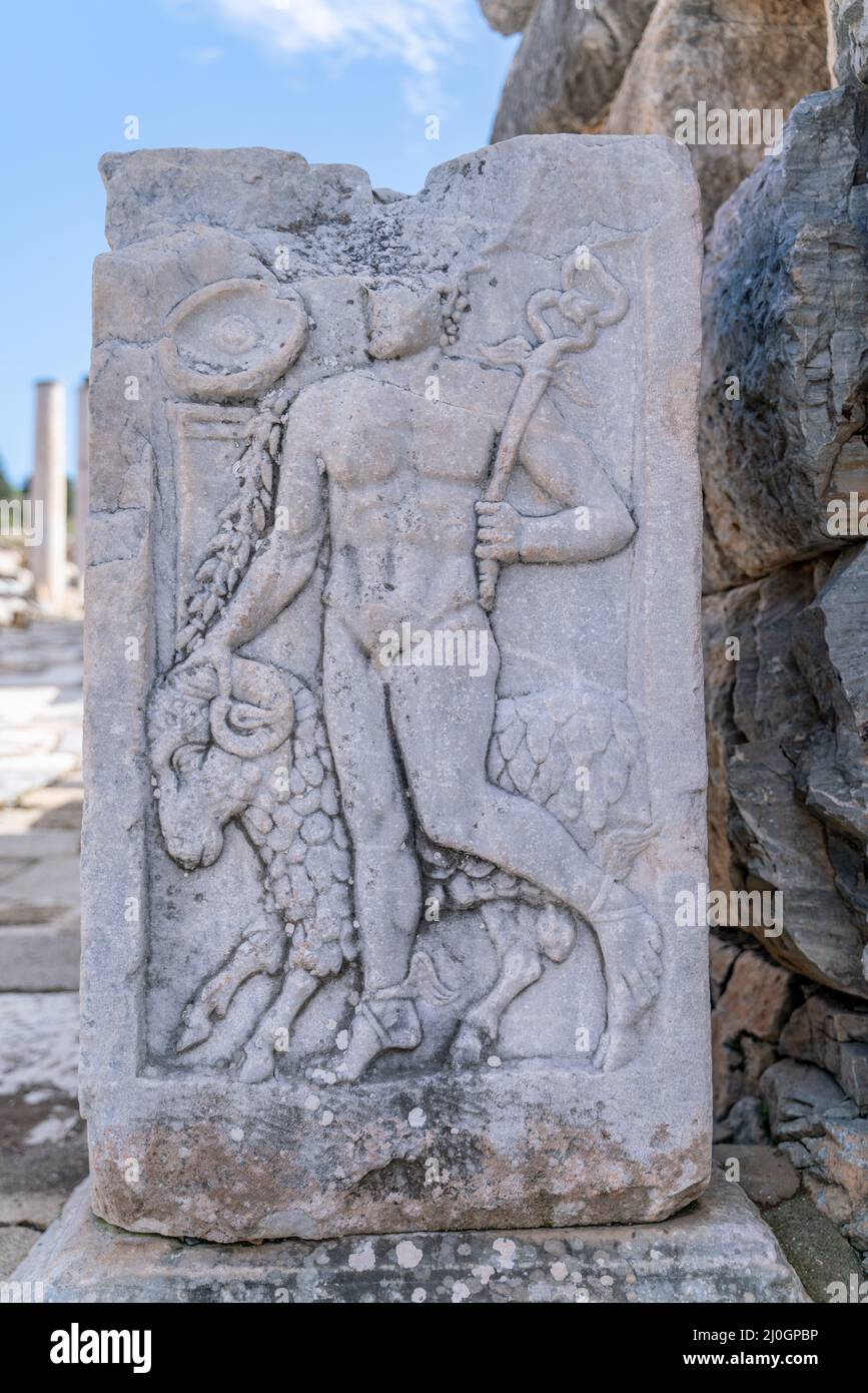 Carving of god of commerce Hermes and ram image in Ephesus, Selcuk ...